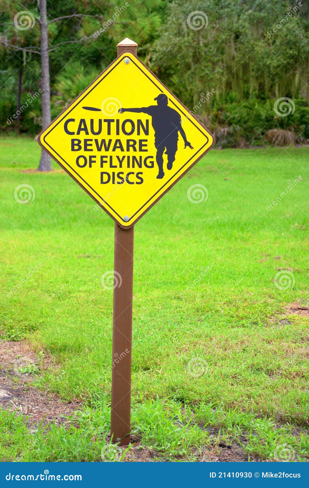 Disc Golf Caution Sign With No Swimming Sign On The Same Post Stock ...