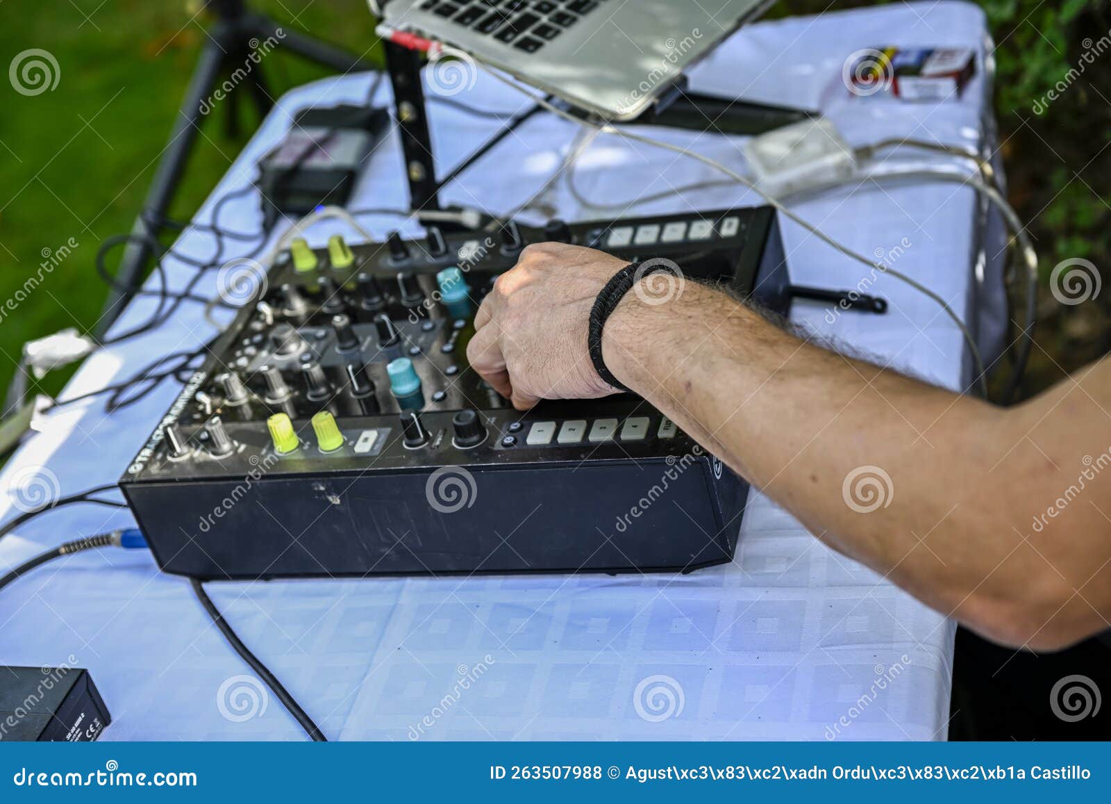 Disc Jockey, Mixing Music on the Digital Controller Table of a Sound ...