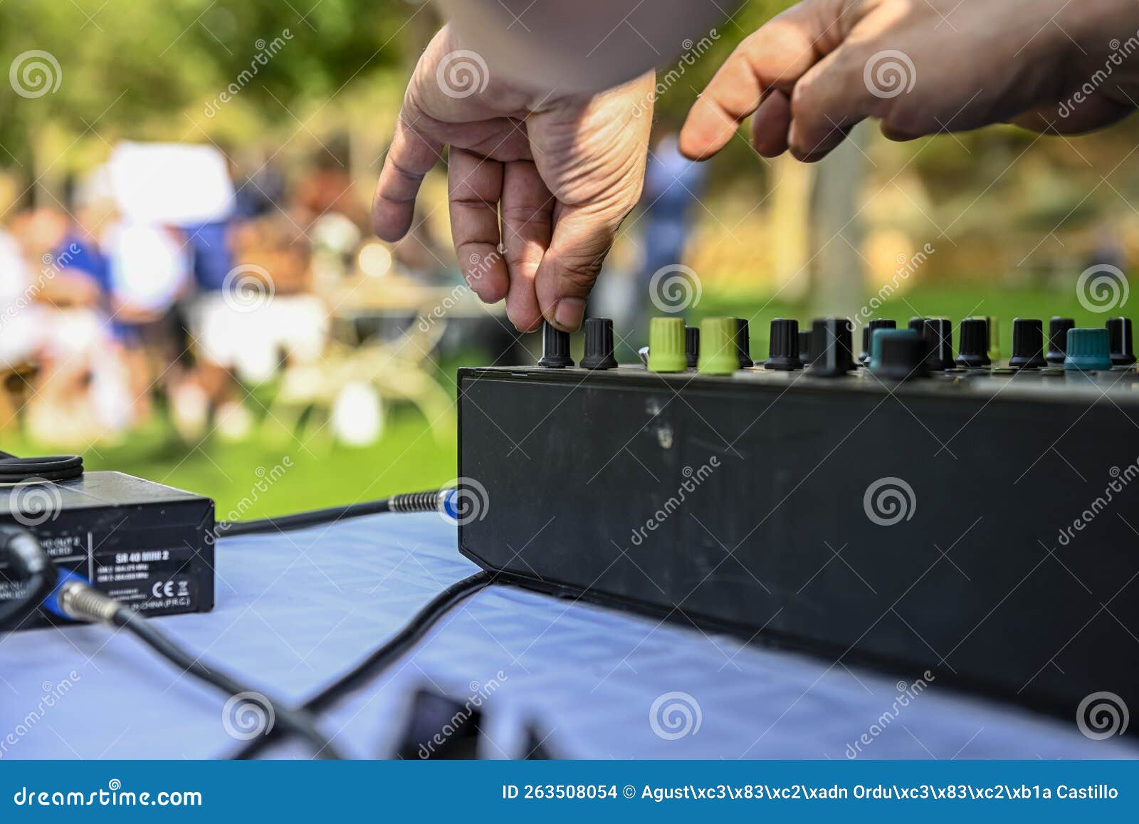 Disc Jockey, Mixing Music on the Digital Controller Table of a Sound ...