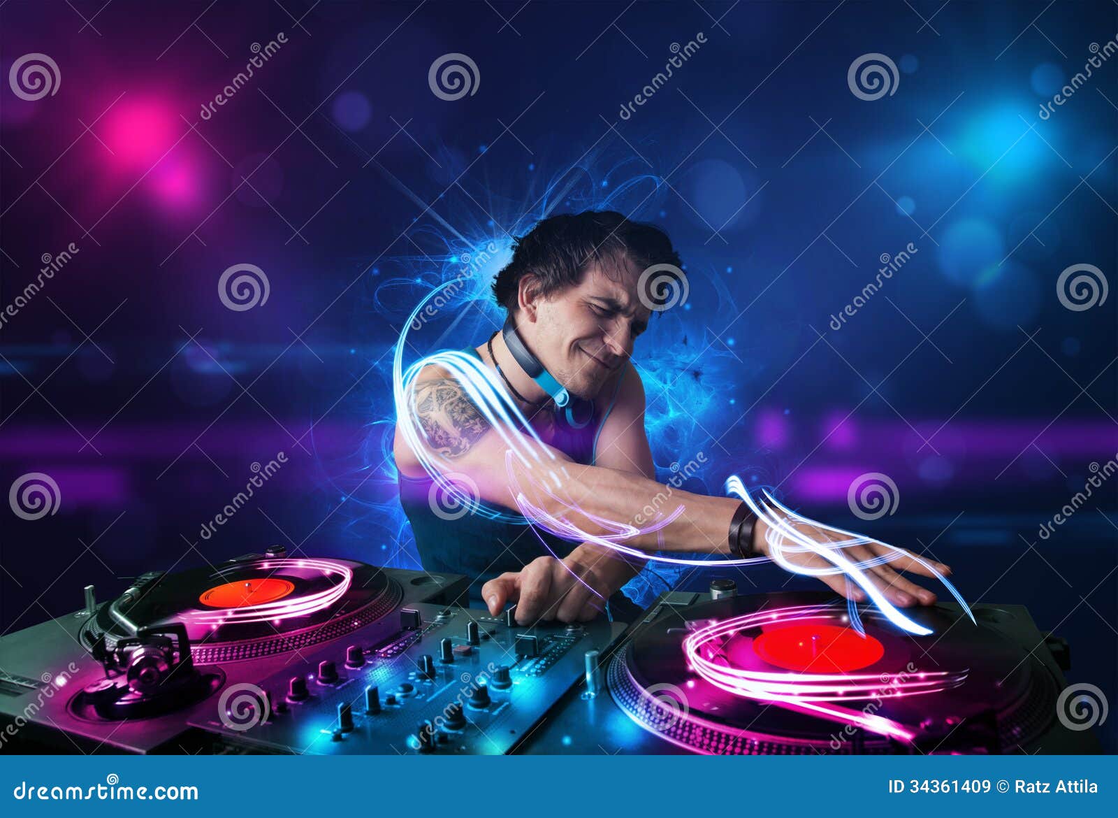 Disc Jockey Playing Music with Electro Light Effects and Lights Stock ...