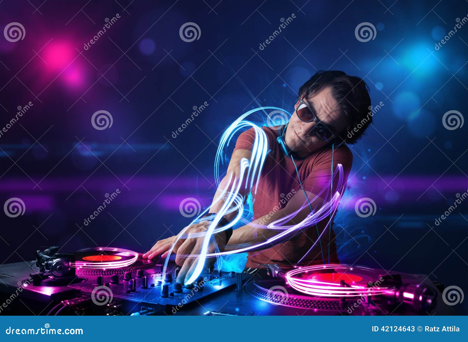 Disc Jockey Playing Music with Electro Light Effects and Lights Stock ...