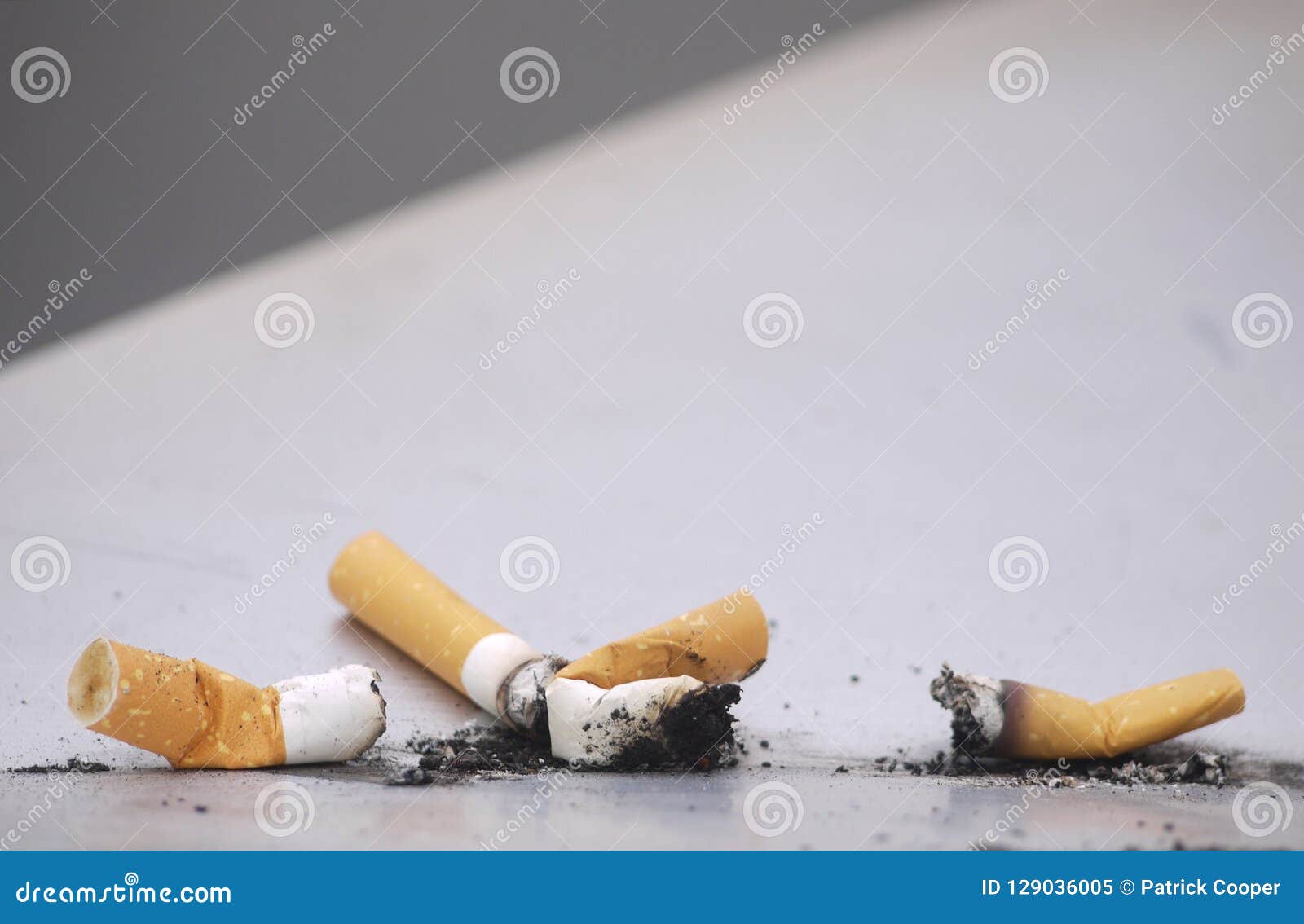 Discarded Cigarettes on Metallic Surface Stock Image - Image of ...