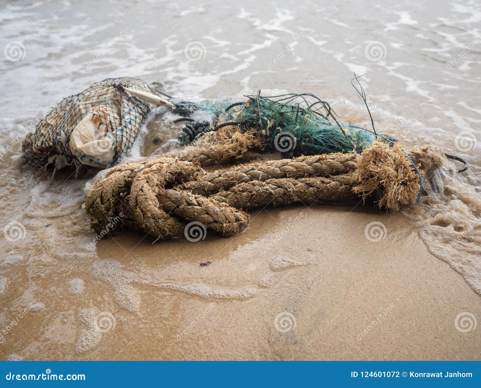 Discarded Fishing Net and Rope on the Beach Stock Photo - Image of ...