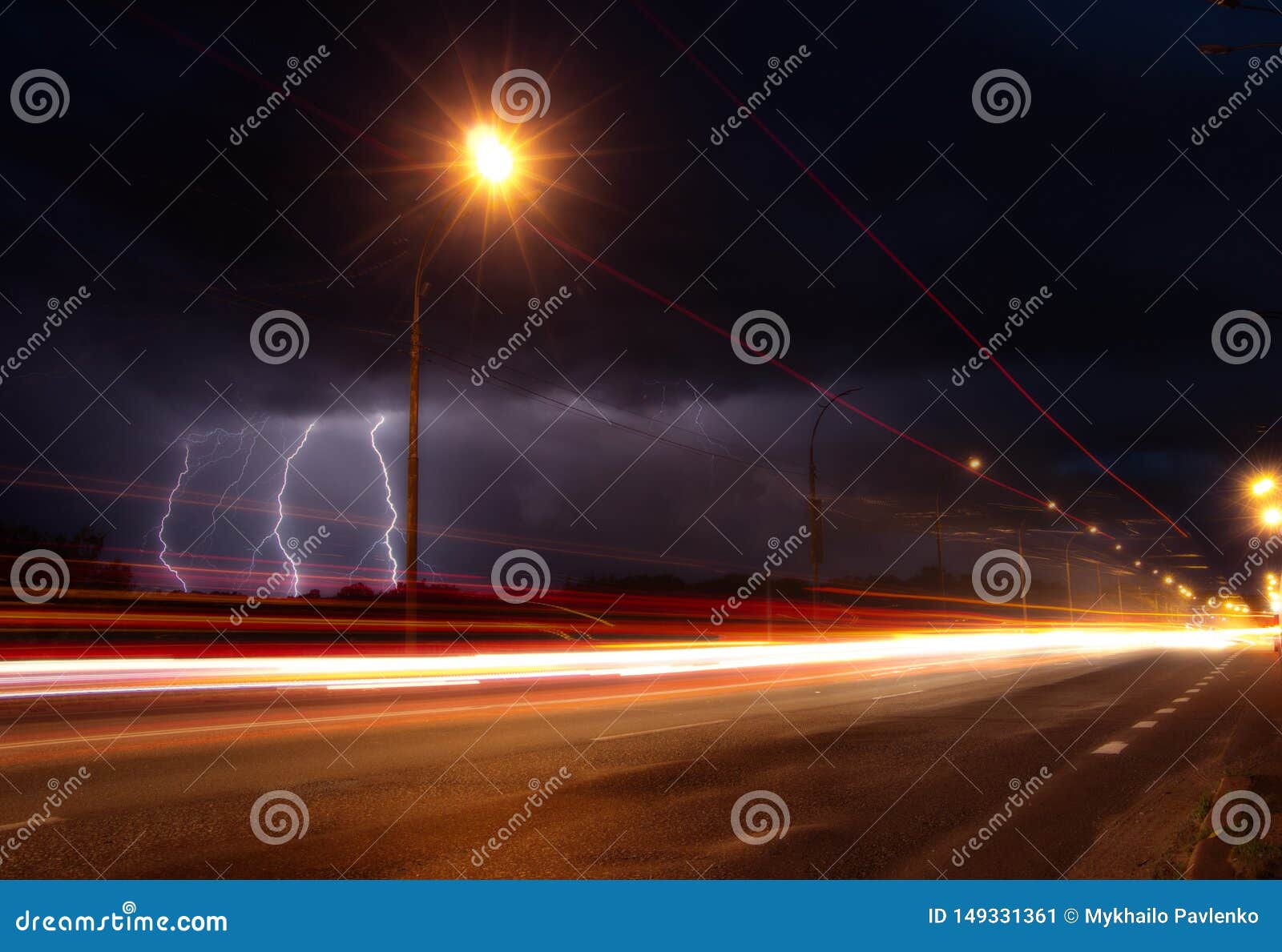 Discharges of Lightning in the Night Sky Over the Road Stock Image ...