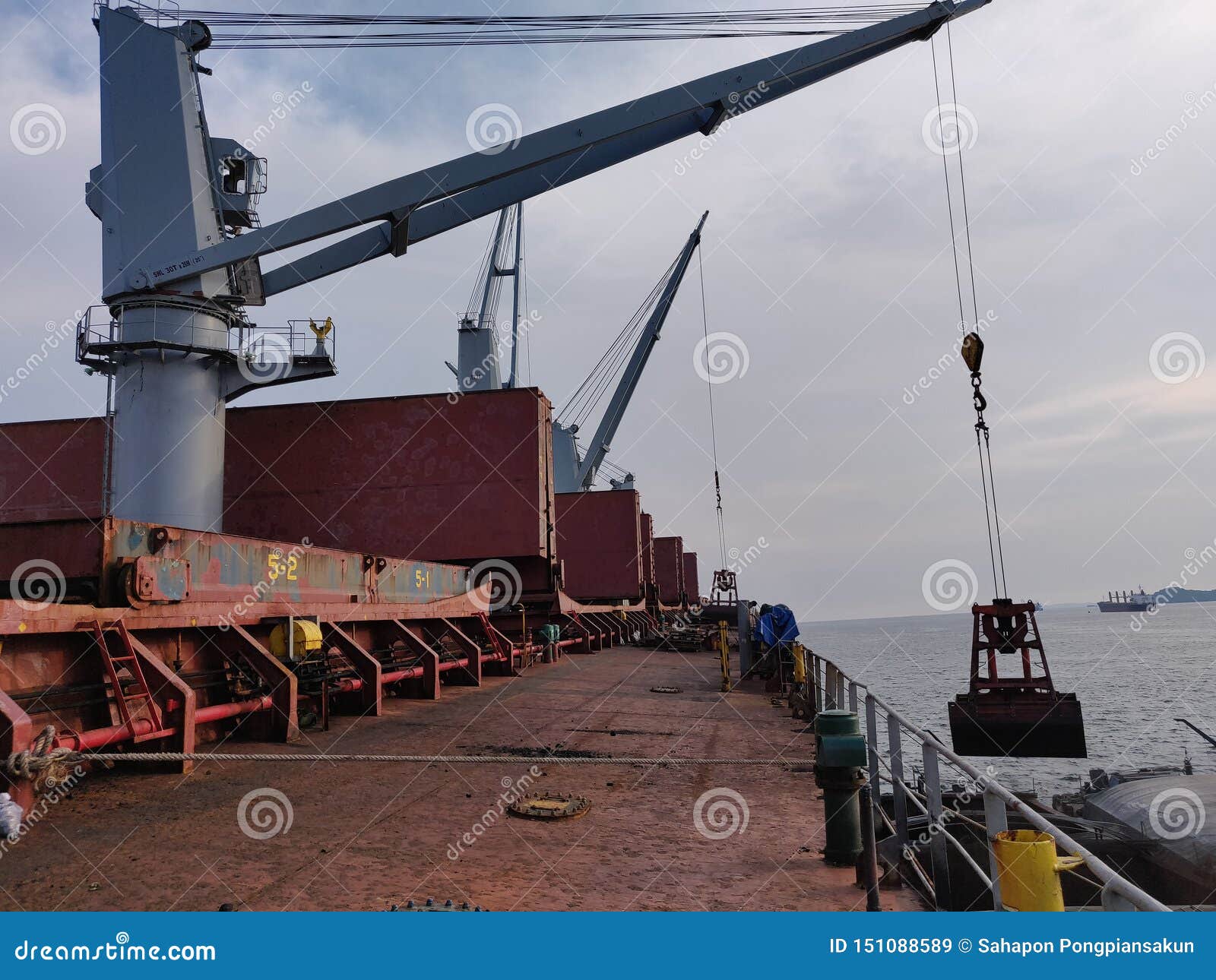 Discharging or Loading Operation on Bulk Ship Stock Image - Image of ...