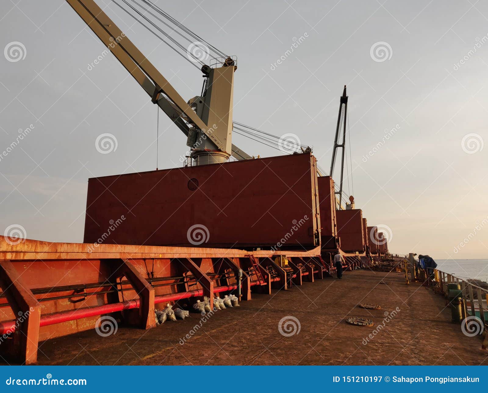 Discharging And Loading Of Containers. Editorial Photo | CartoonDealer ...