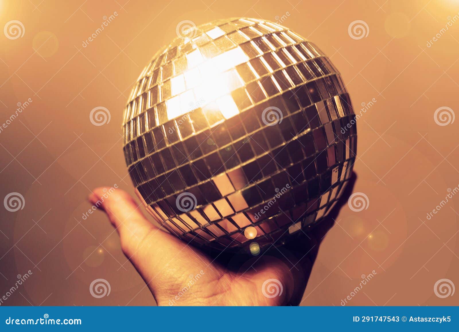 Disco ball in a hand stock image. Image of symmetry - 291747543