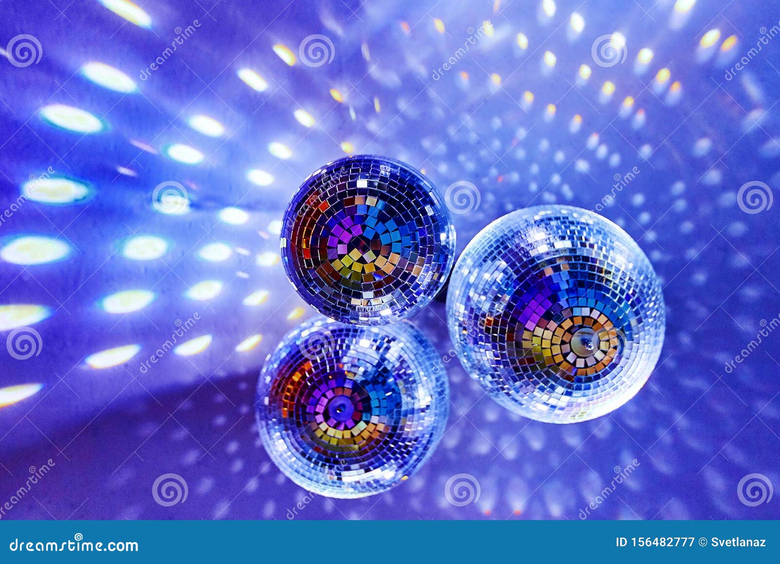 Disco Balls with Bright Rays and Highlights at the Night Disco in the ...