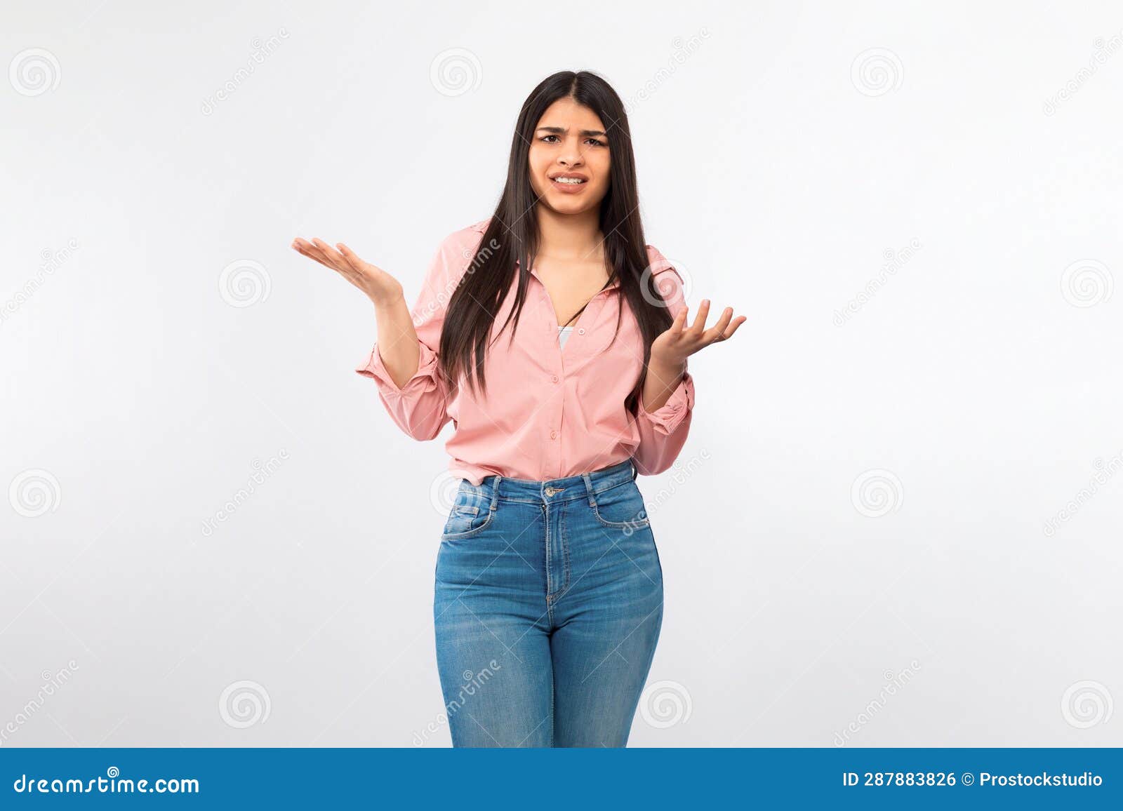 Discontented Young Lady Shrugging Shoulders Standing Over White Studio ...