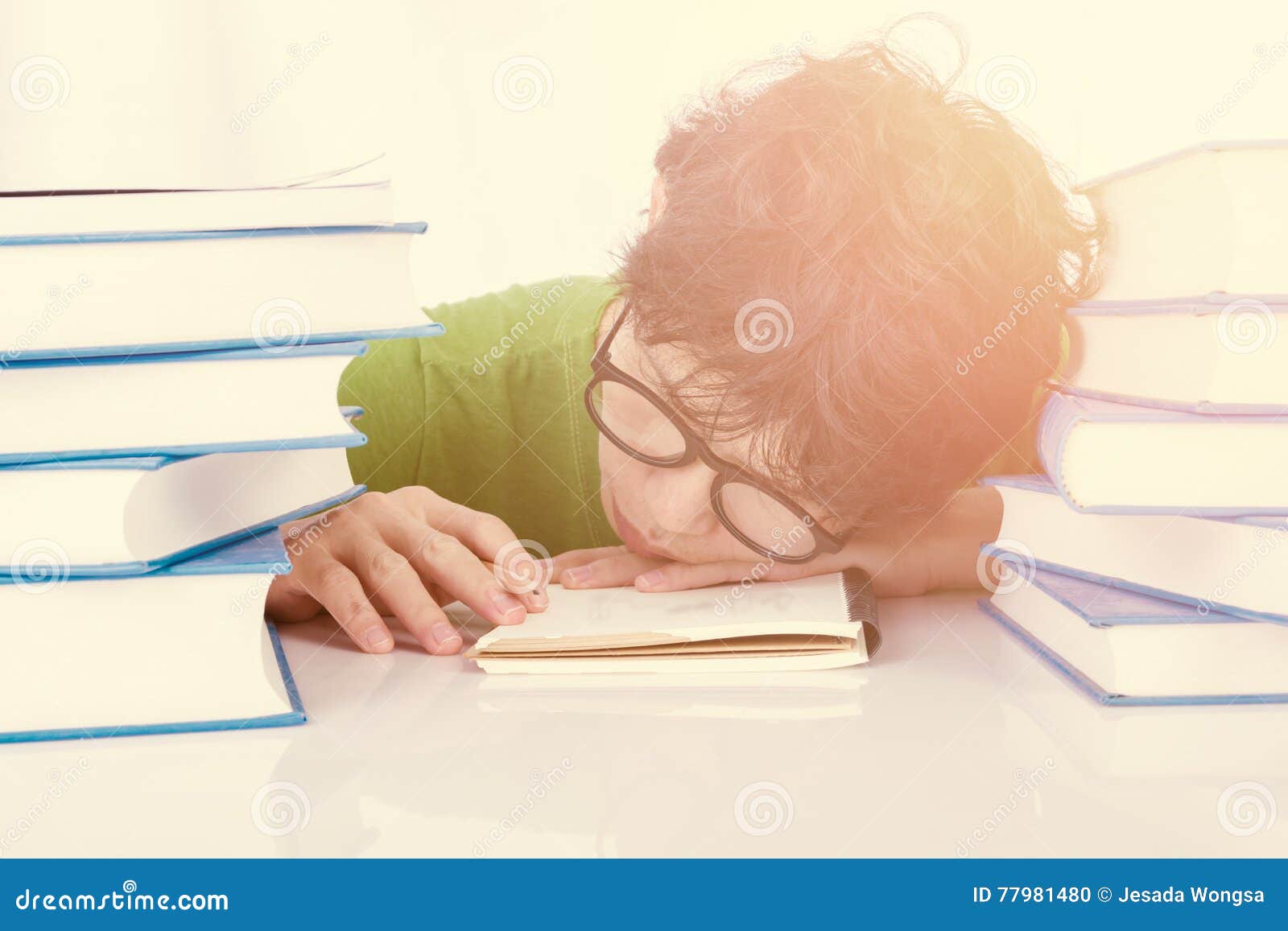 Discouraged Student Sleep at Table in Front of His Homework Stock Photo ...