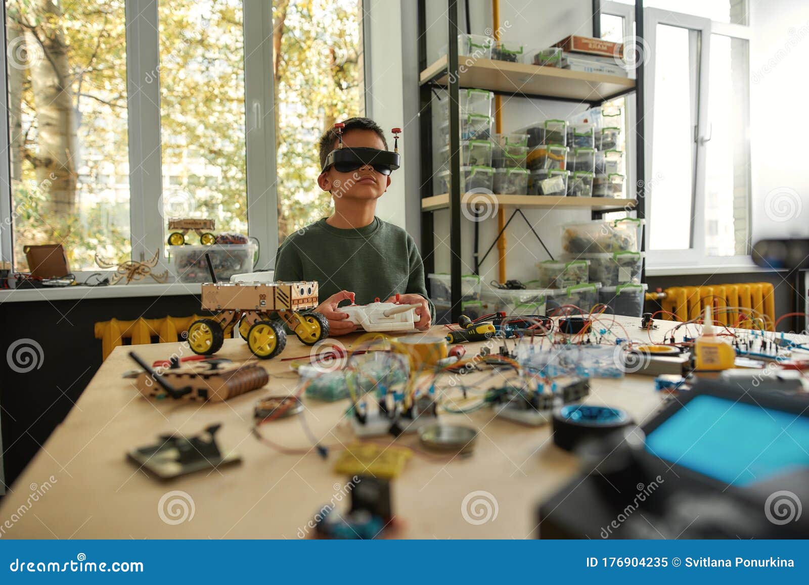 Discover What is Possible. Child Programming, Testing Robot Vehicle ...