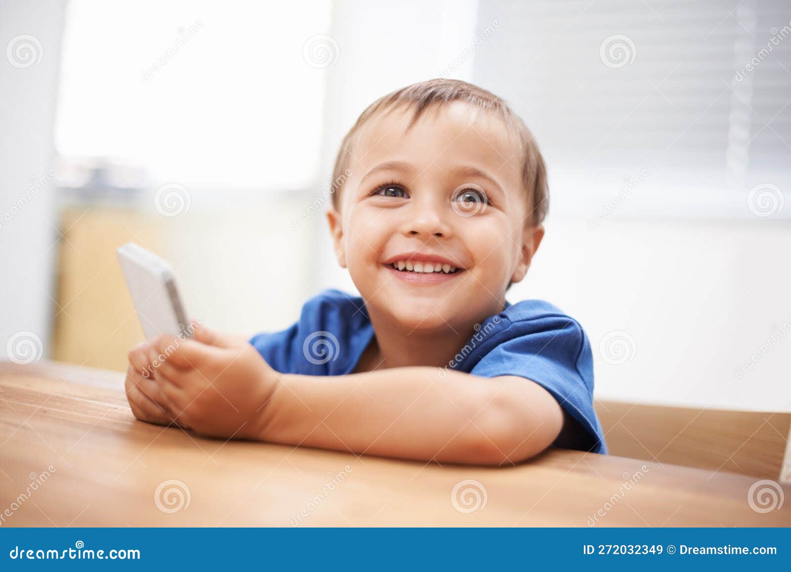 Discovering the World of Technology. a Cute Little Boy Playing with a ...
