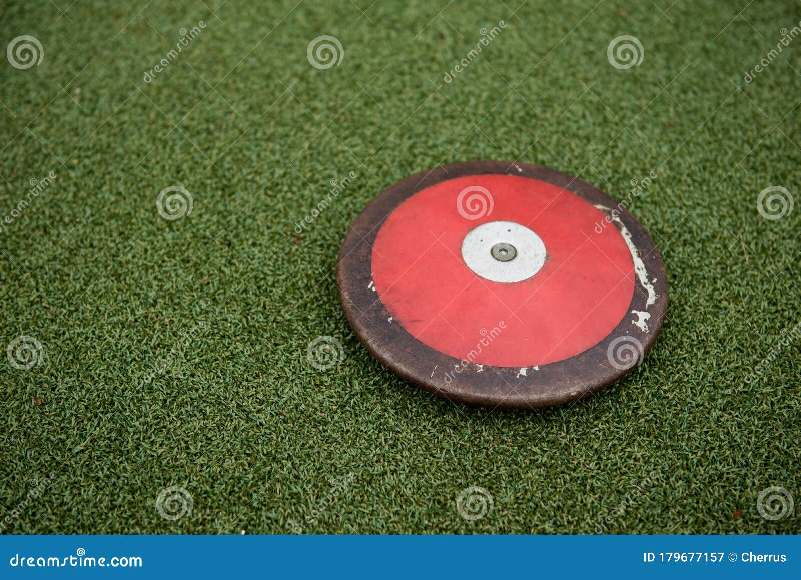 Discus on the grass stock image. Image of competition - 179677157