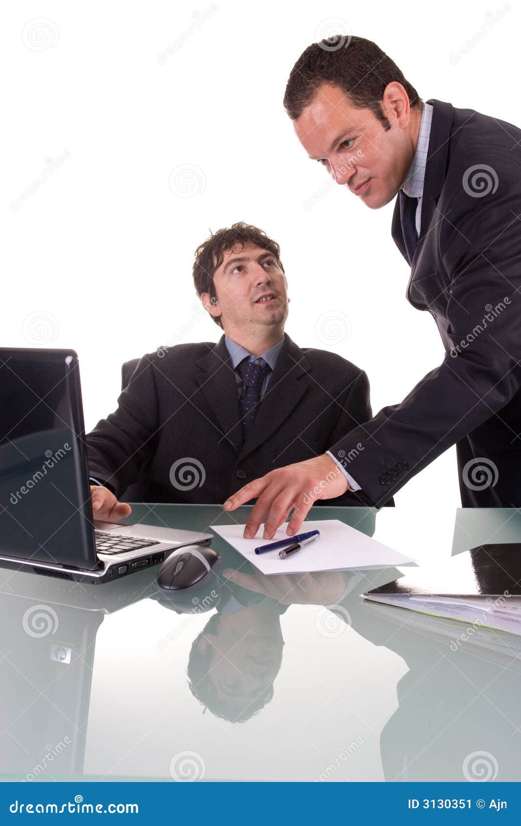 Discussing stock image. Image of mouse, male, laptop, papers - 3130351