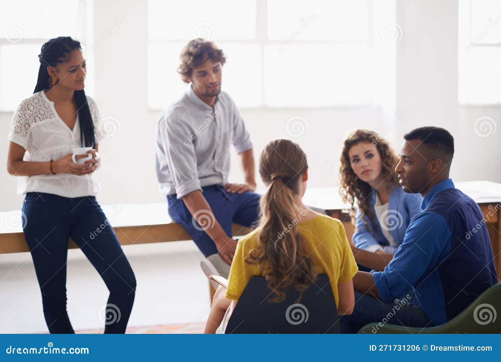 Discussing Business. a Group of Colleagues in a Meeting. Stock Photo ...