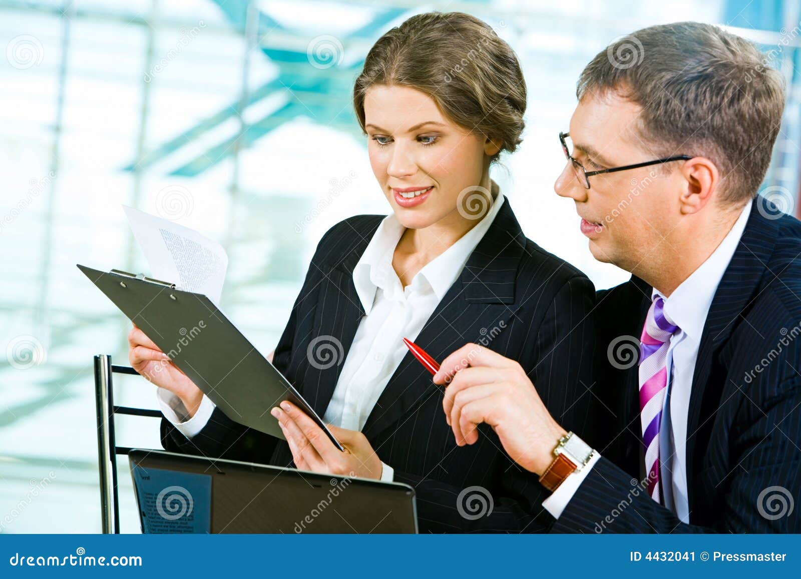 Discussing business plan stock image. Image of dressed - 4432041