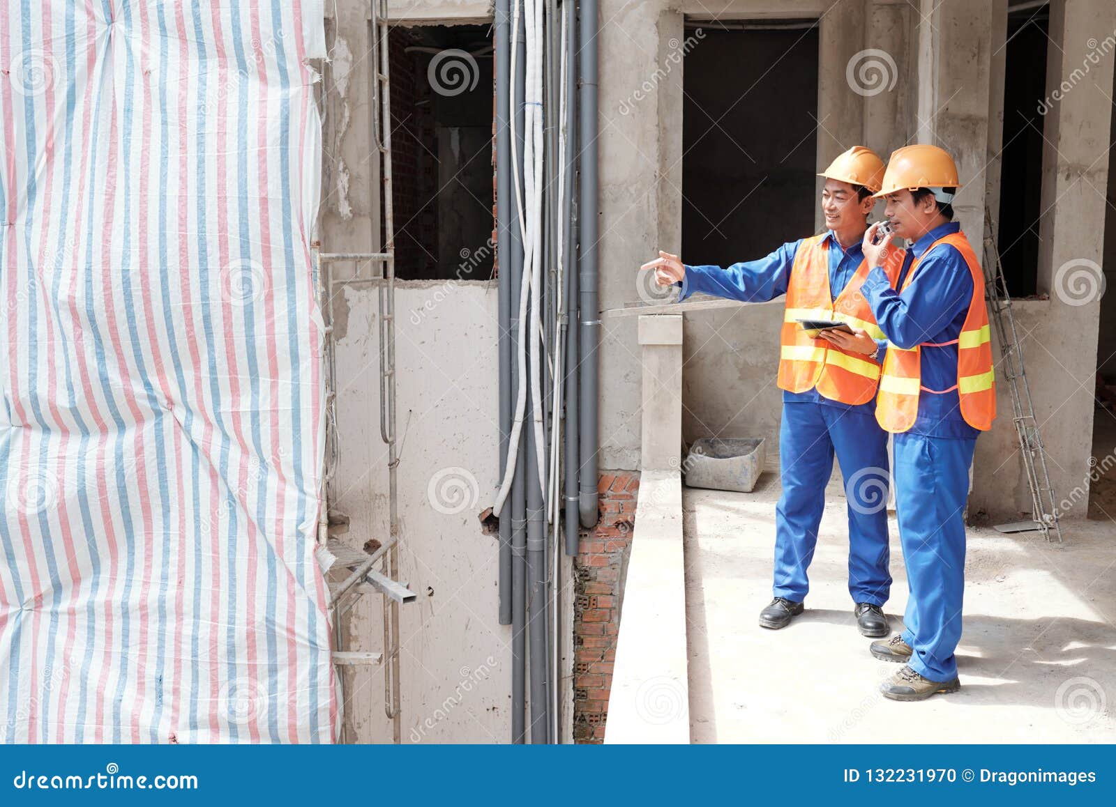 Discussing Communications Installation Stock Photo - Image of foreman ...