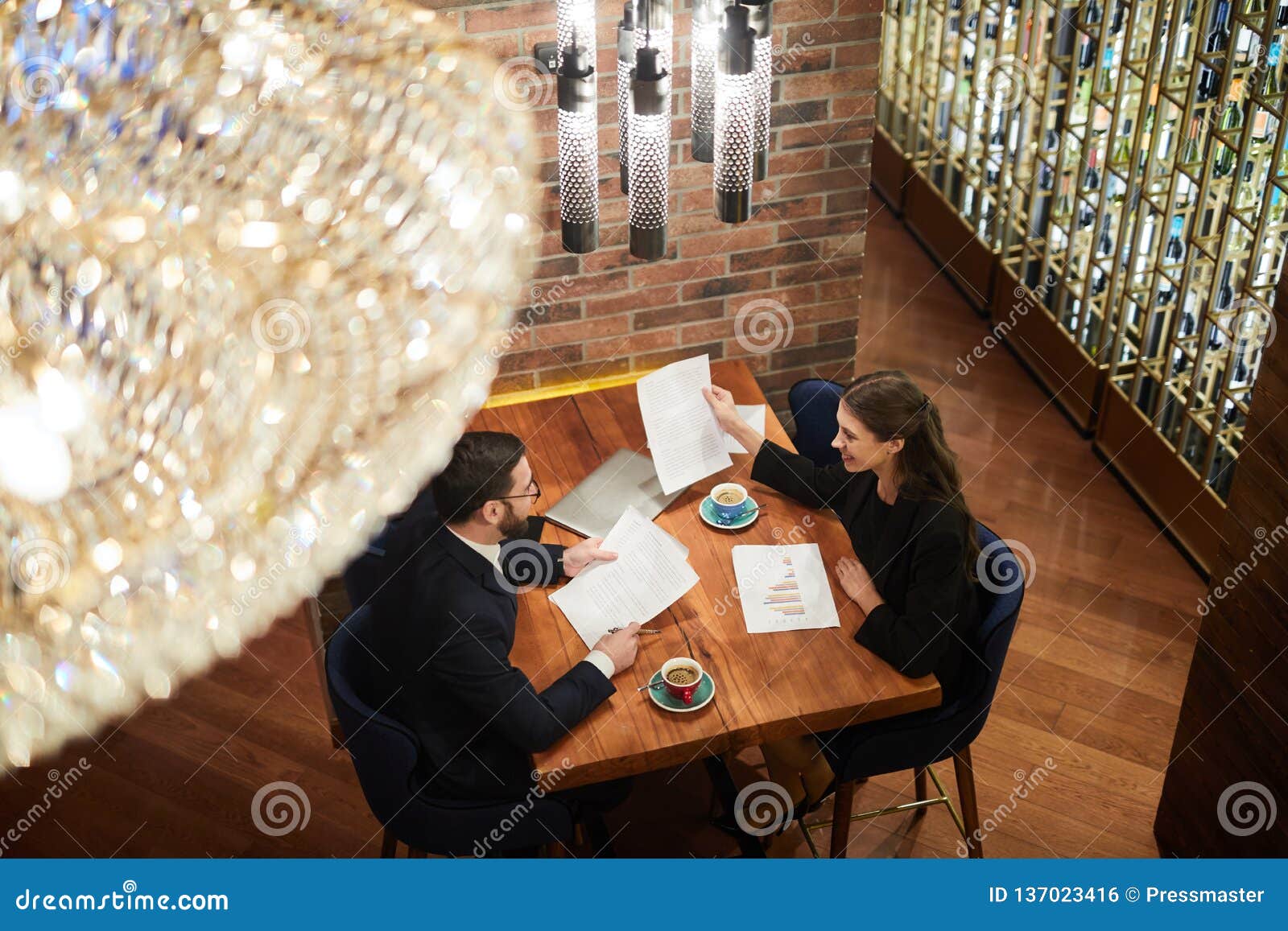 Discussing contract stock photo. Image of colleague - 137023416