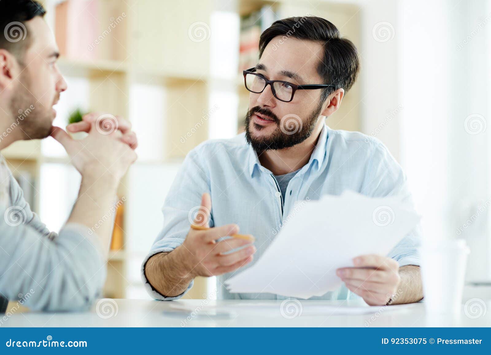 Discussing contract stock image. Image of explaining - 92353075