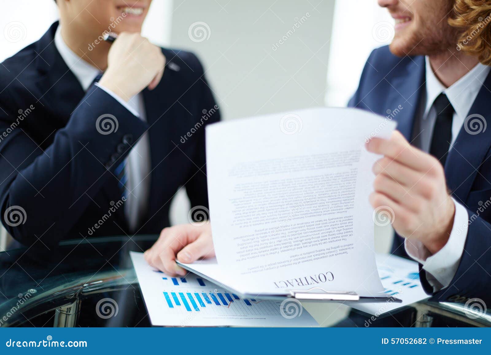 Discussing contract stock photo. Image of closeup, contemporary - 57052682