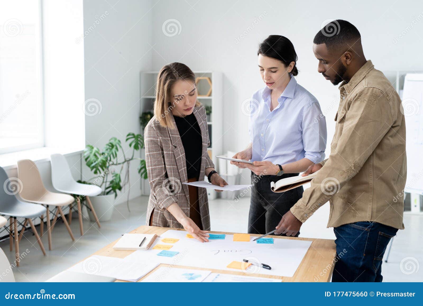 Discussing creative ideas stock photo. Image of communication - 177475660