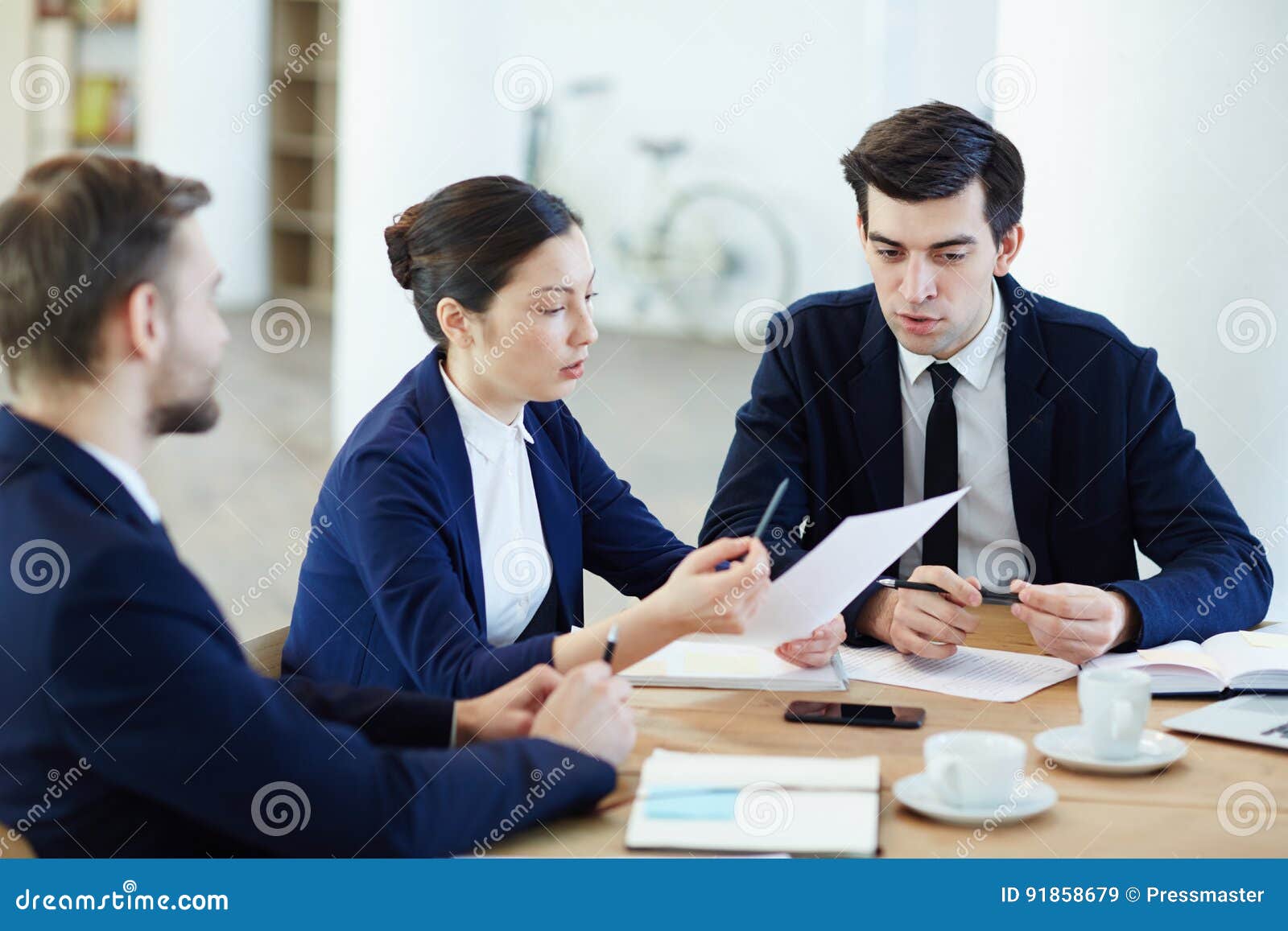 Discussing document stock image. Image of idea, economists - 91858679
