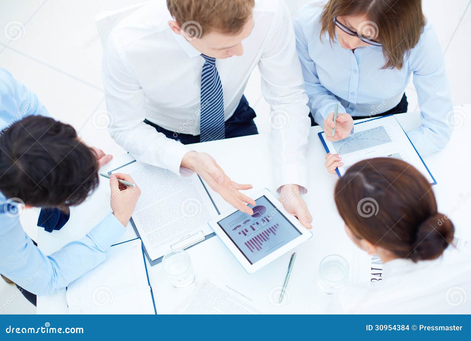 Discussing document stock photo. Image of cooperation - 30954384 Discussing document stock photo. Image of cooperation - 30954384