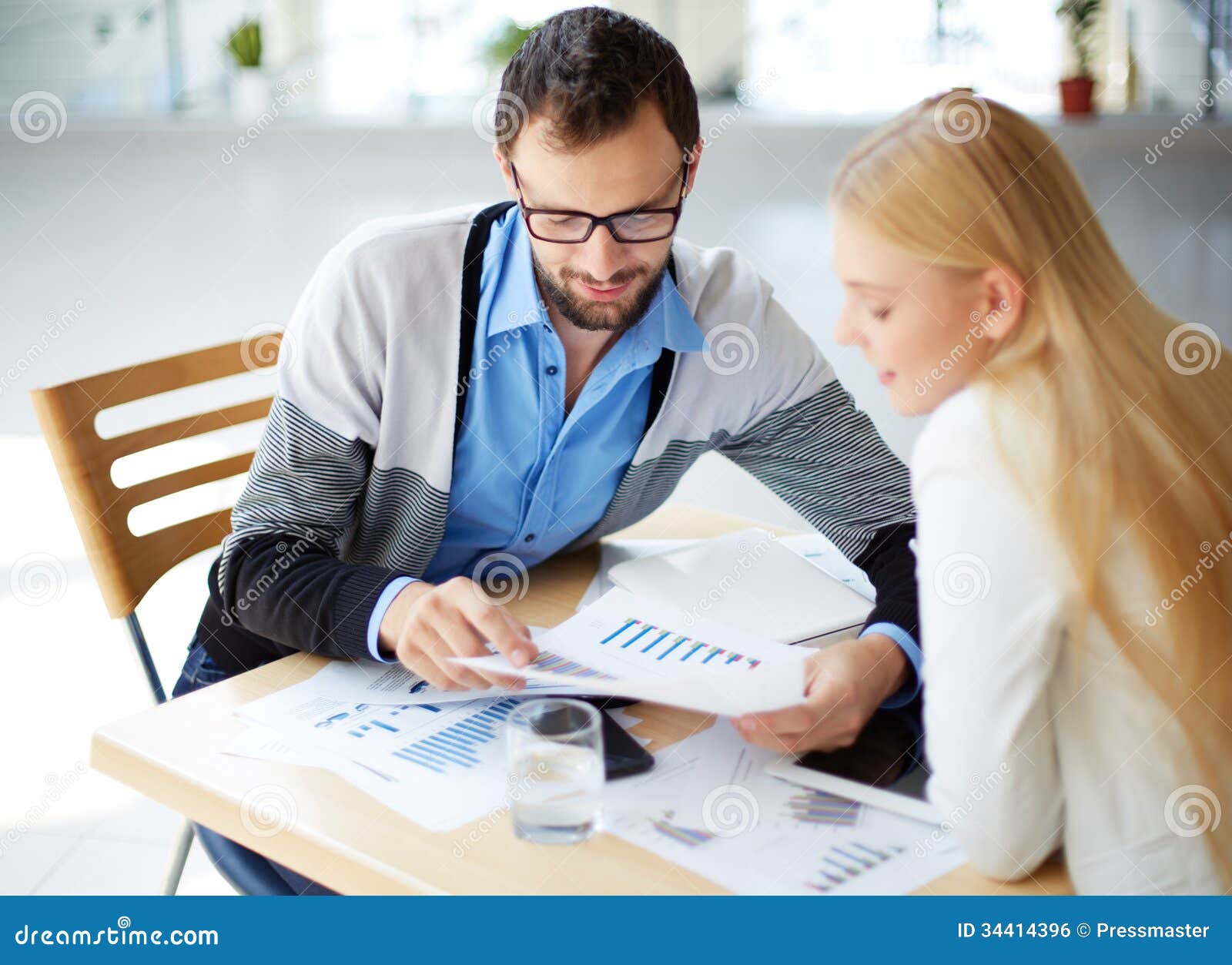 Discussing document stock photo. Image of coworker, confident - 34414396