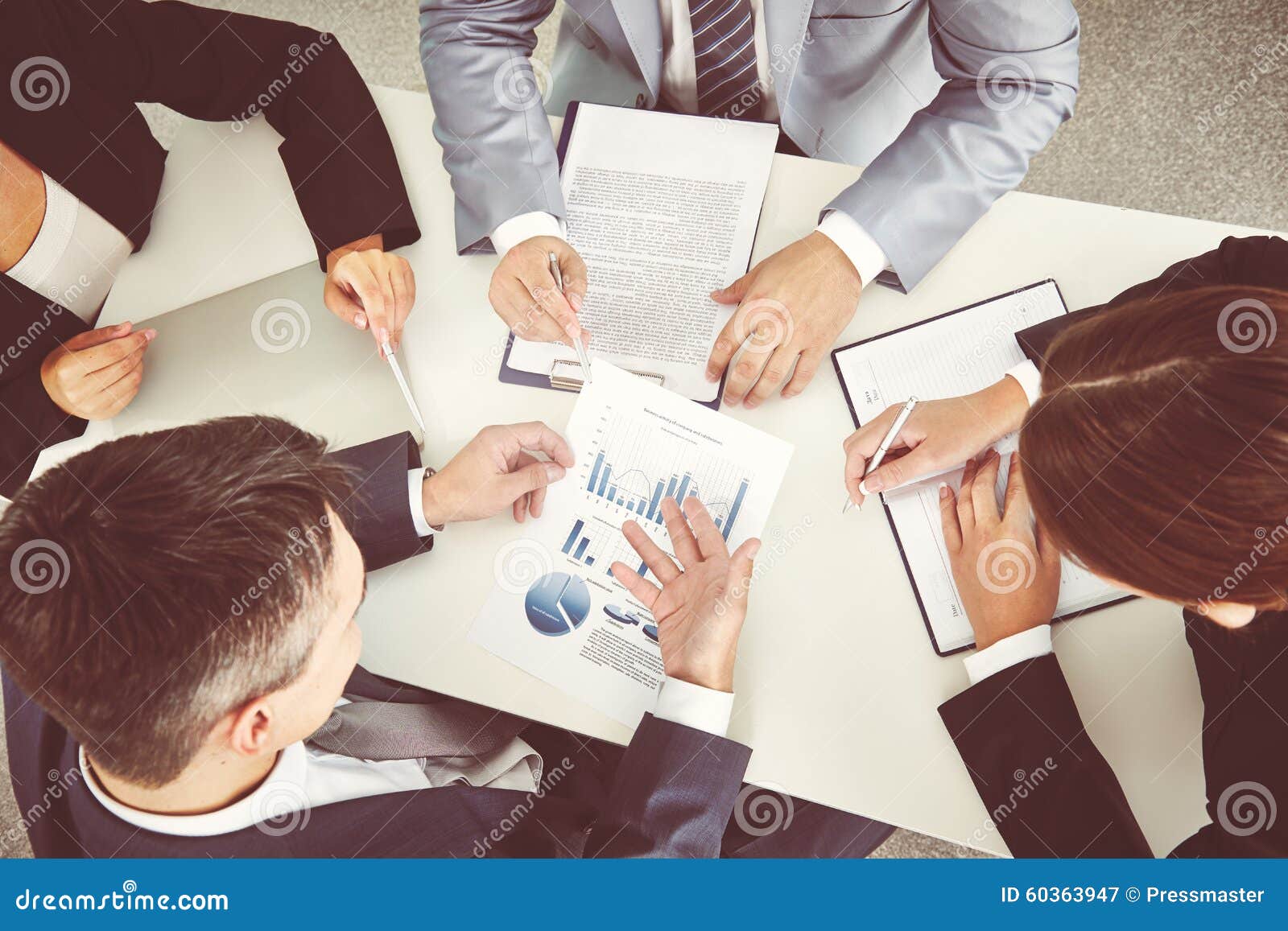 Discussing documents stock image. Image of team, consulting - 60363947