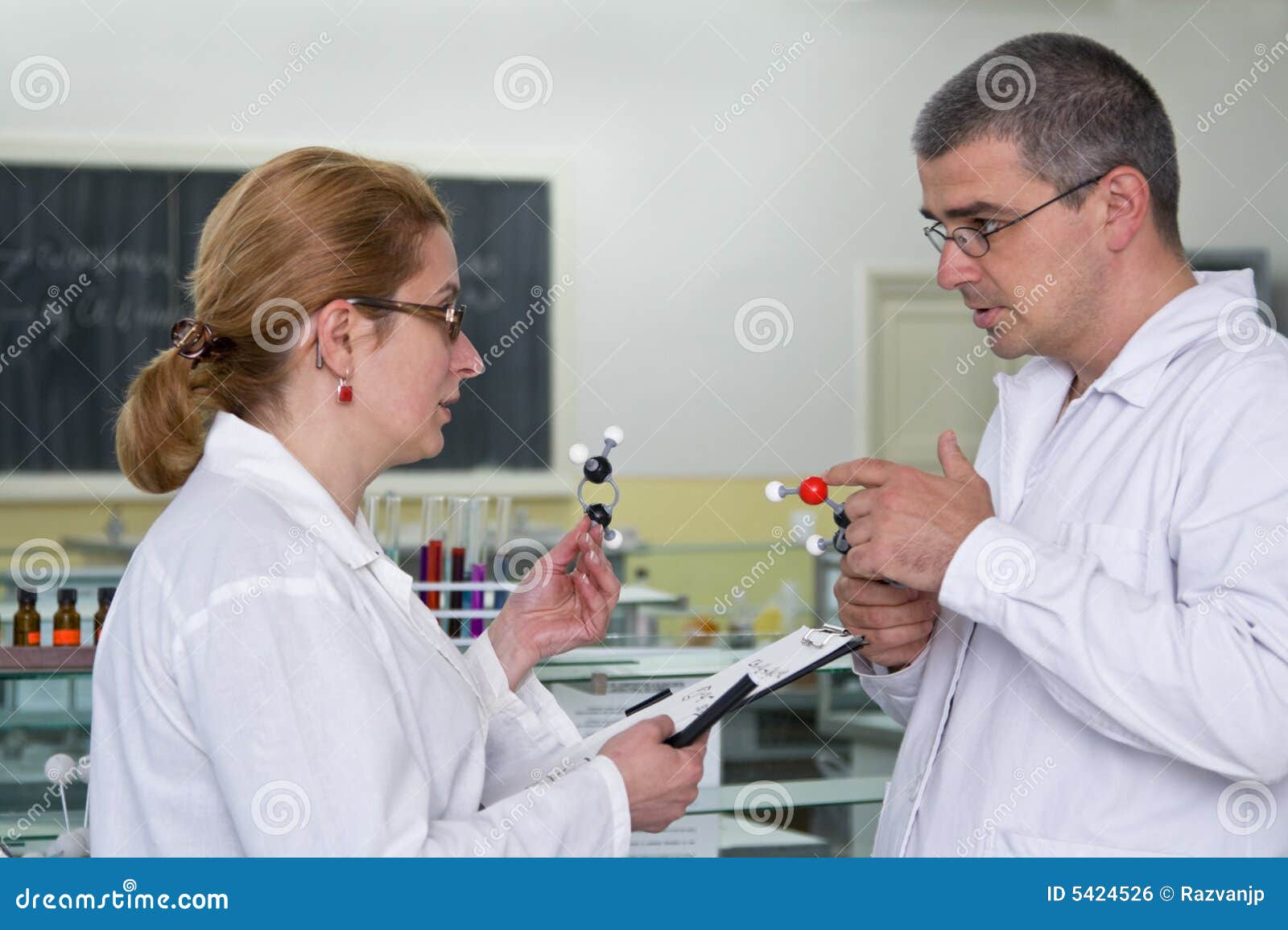 Discussing the experiment stock photo. Image of chemical - 5424526
