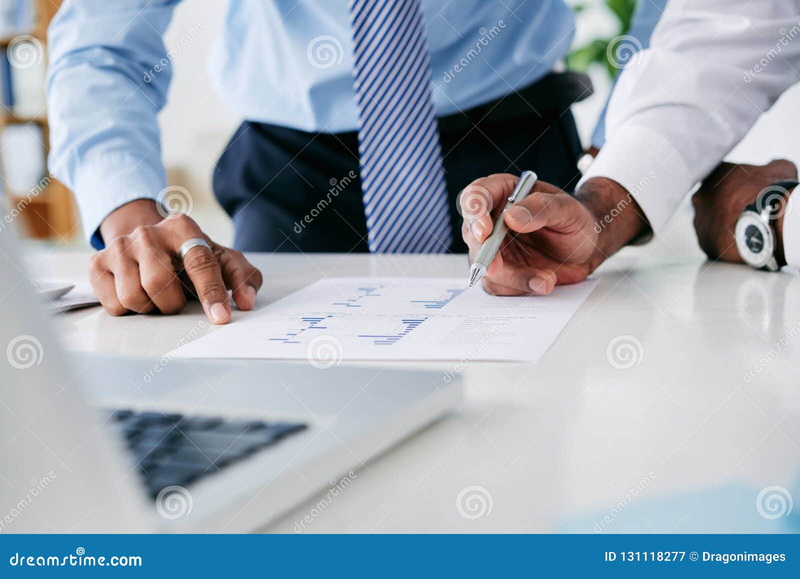 Discussing financial chart stock image. Image of financial - 131118277