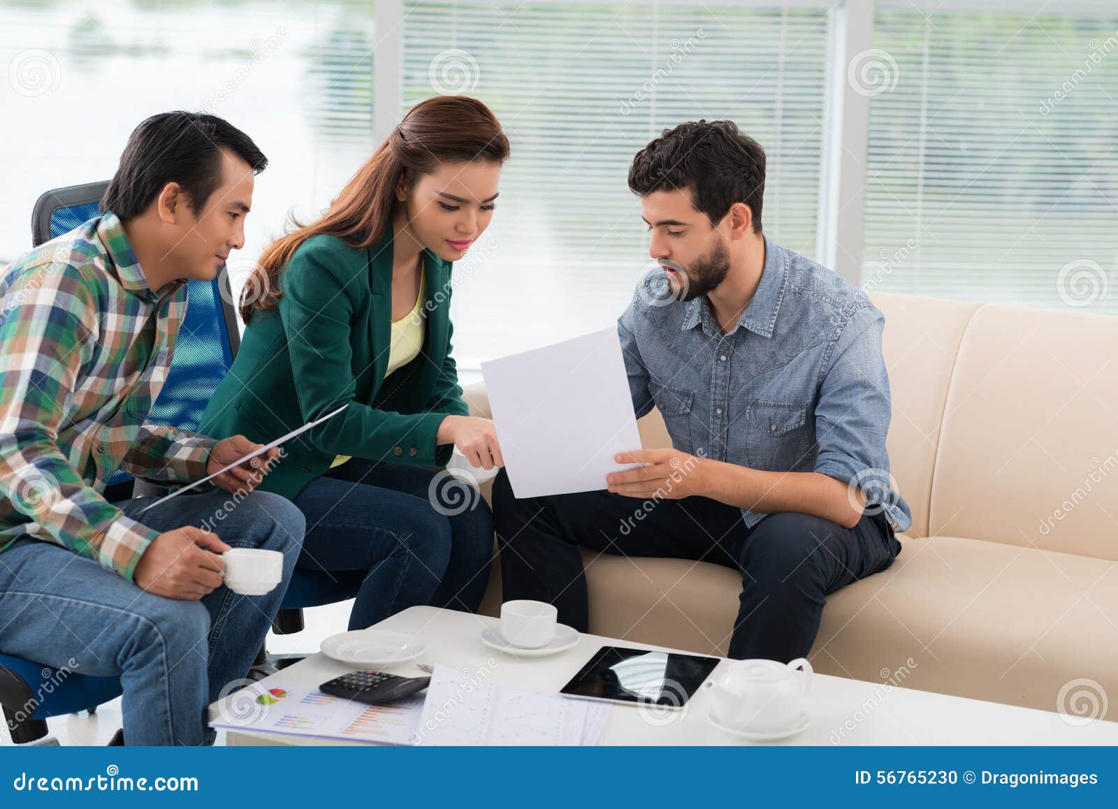 Discussing Financial Documents Stock Photo - Image of woman, partner ...