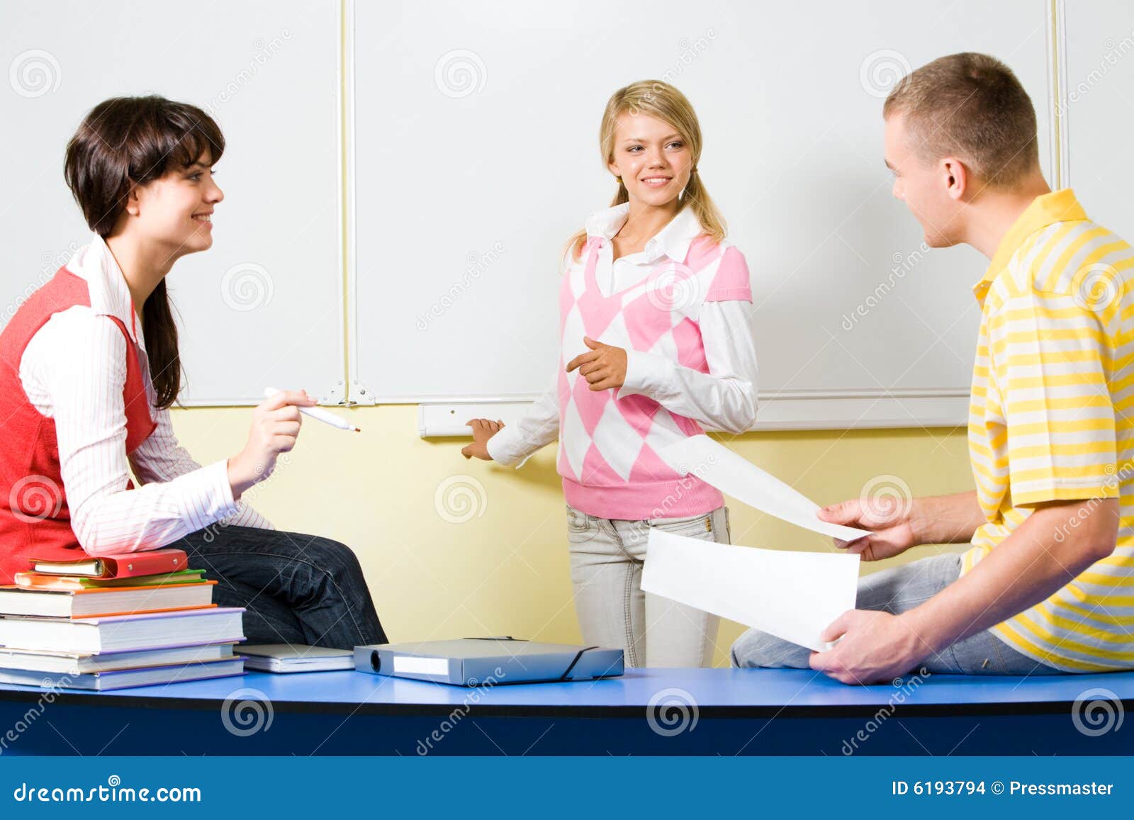 Discussing homework stock photo. Image of group, chatting - 6193794