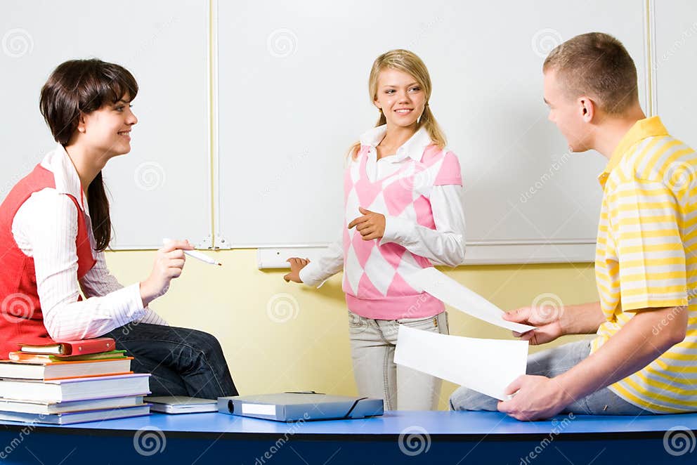 Discussing homework stock photo. Image of group, chatting - 6193794