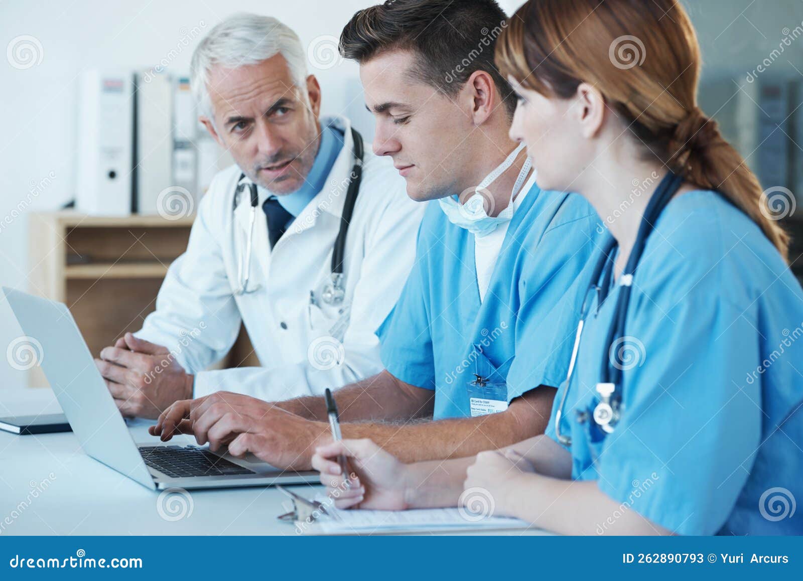 Discussing Important Matters. a Group of Professionals Discussing ...