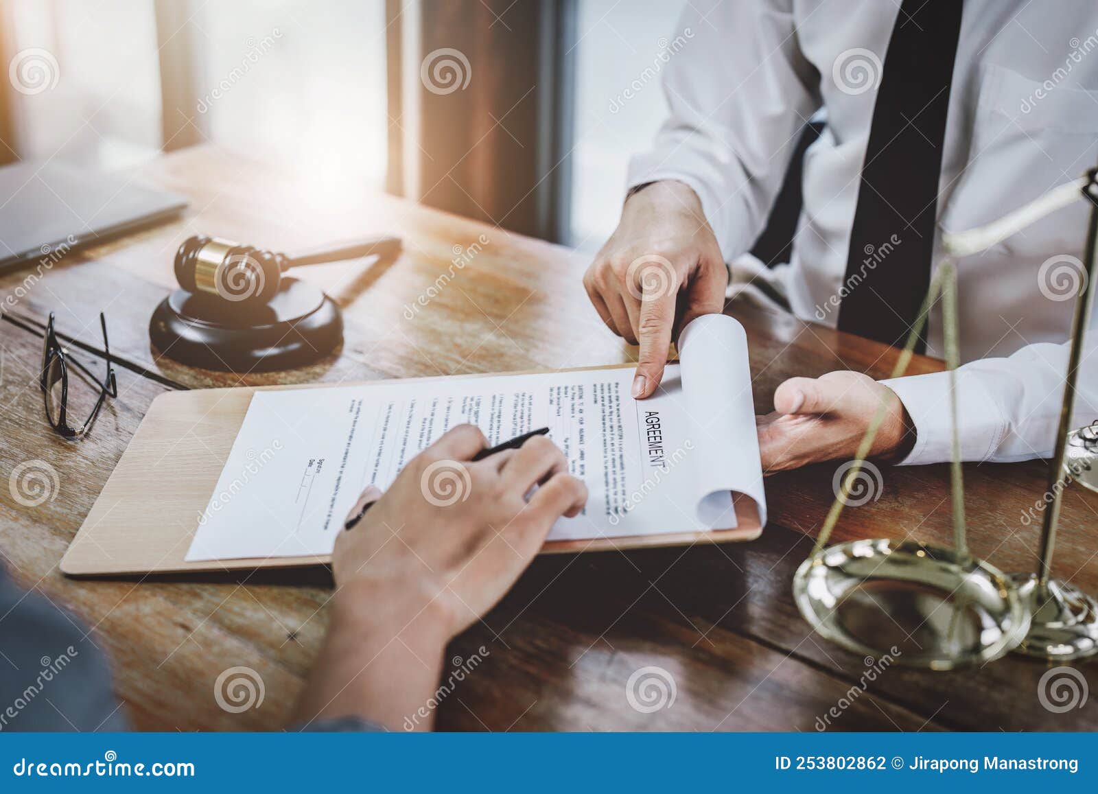 Discussing Legal Matters and Signing Important Documents Stock Photo ...