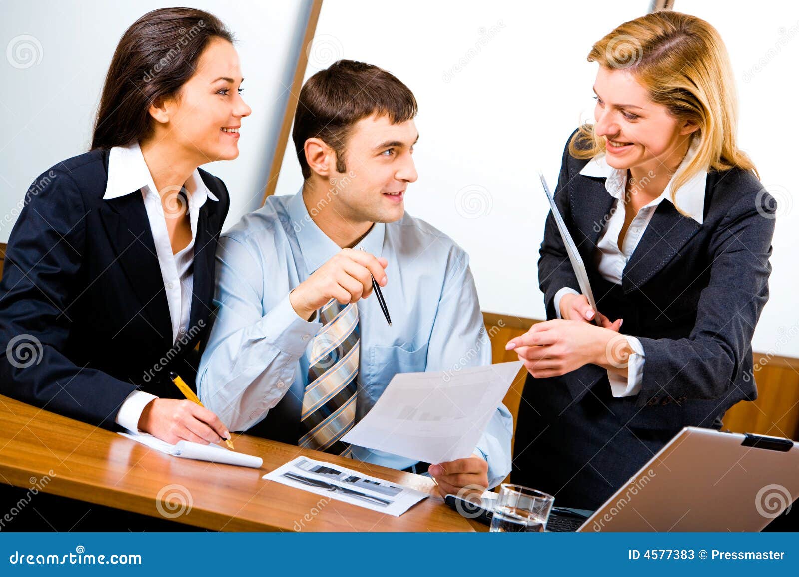 Discussing new project stock image. Image of businessman - 4577383