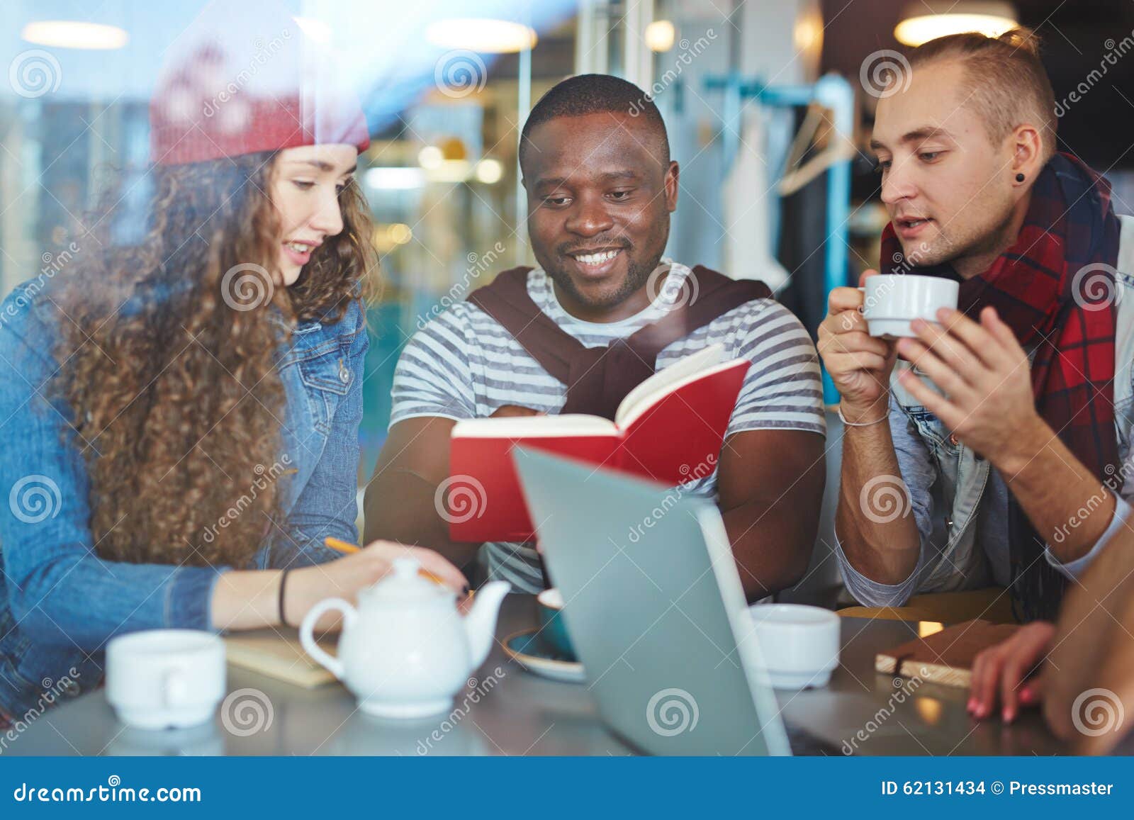 Discussing notes stock photo. Image of pretty, intercultural - 62131434