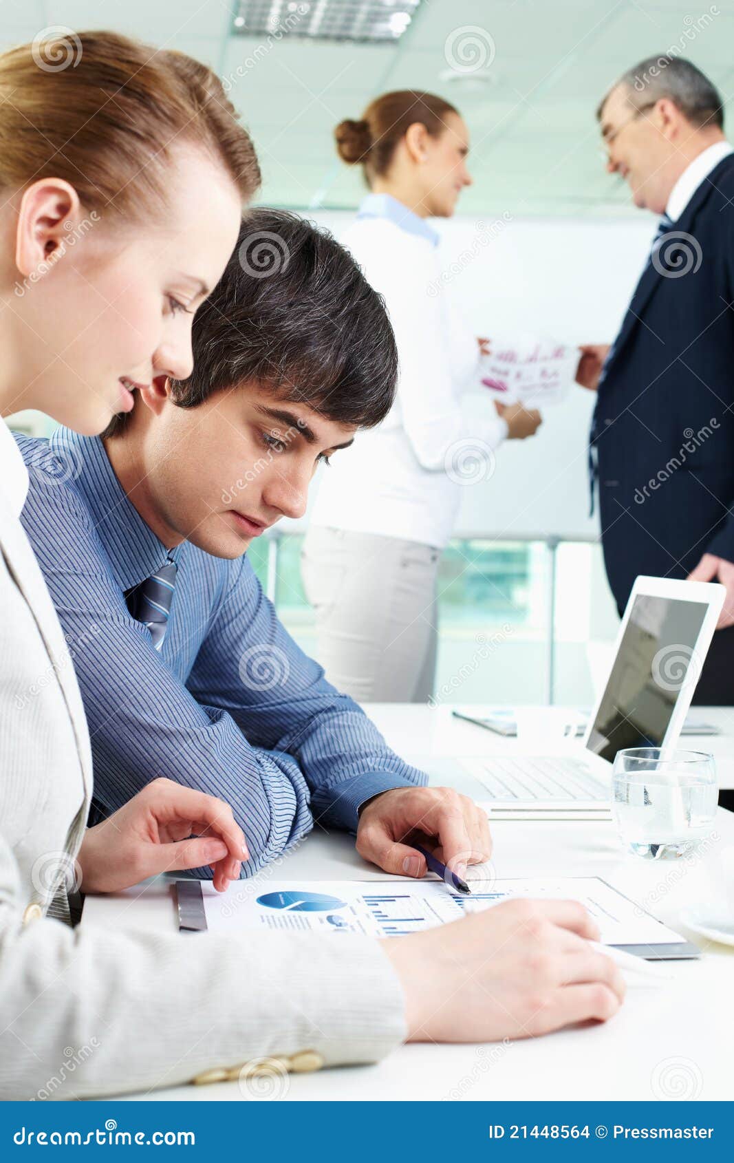 Discussing papers stock photo. Image of lifestyle, colleagues - 21448564