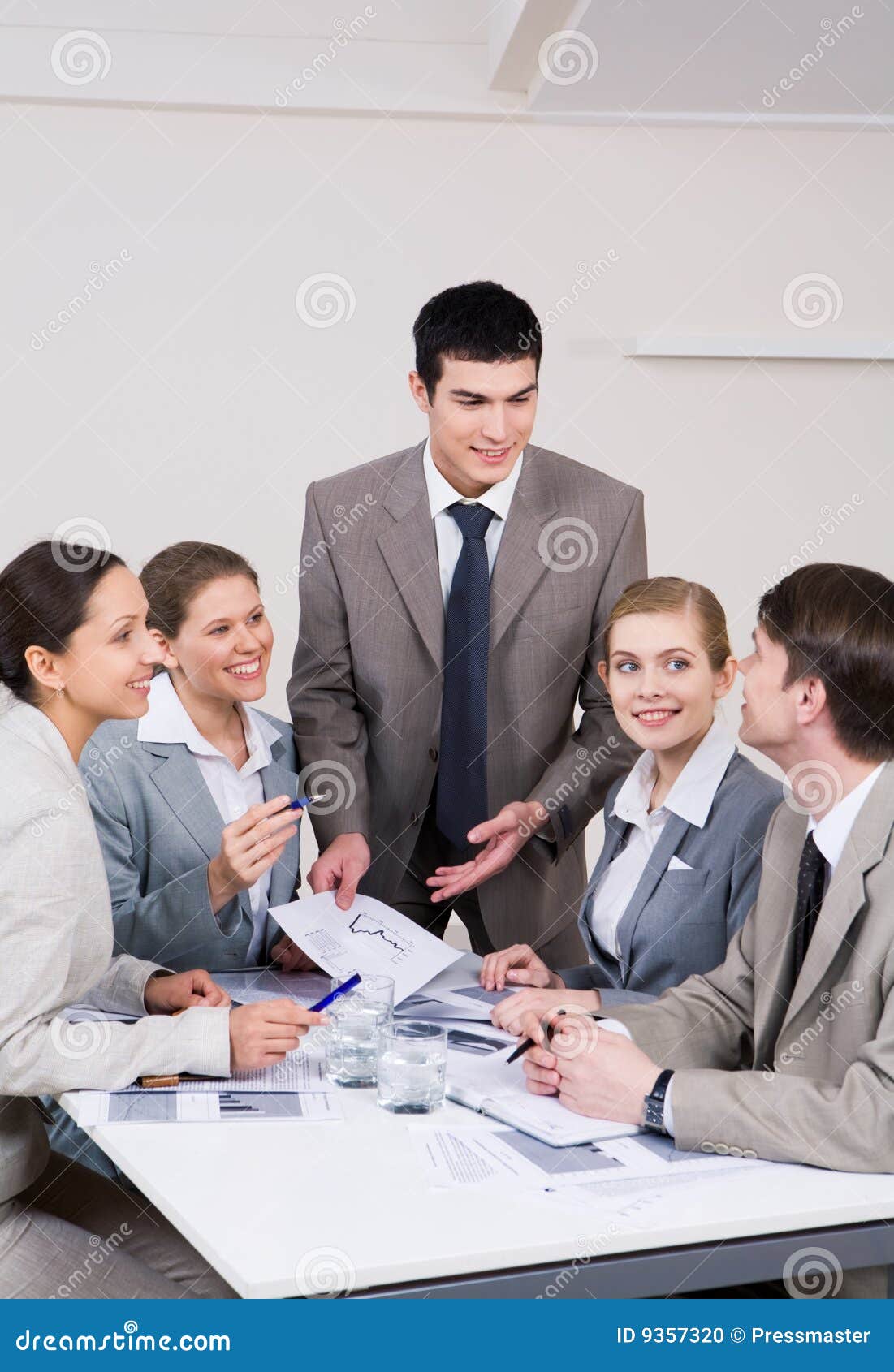 Discussing papers stock photo. Image of businessman, discussing - 9357320
