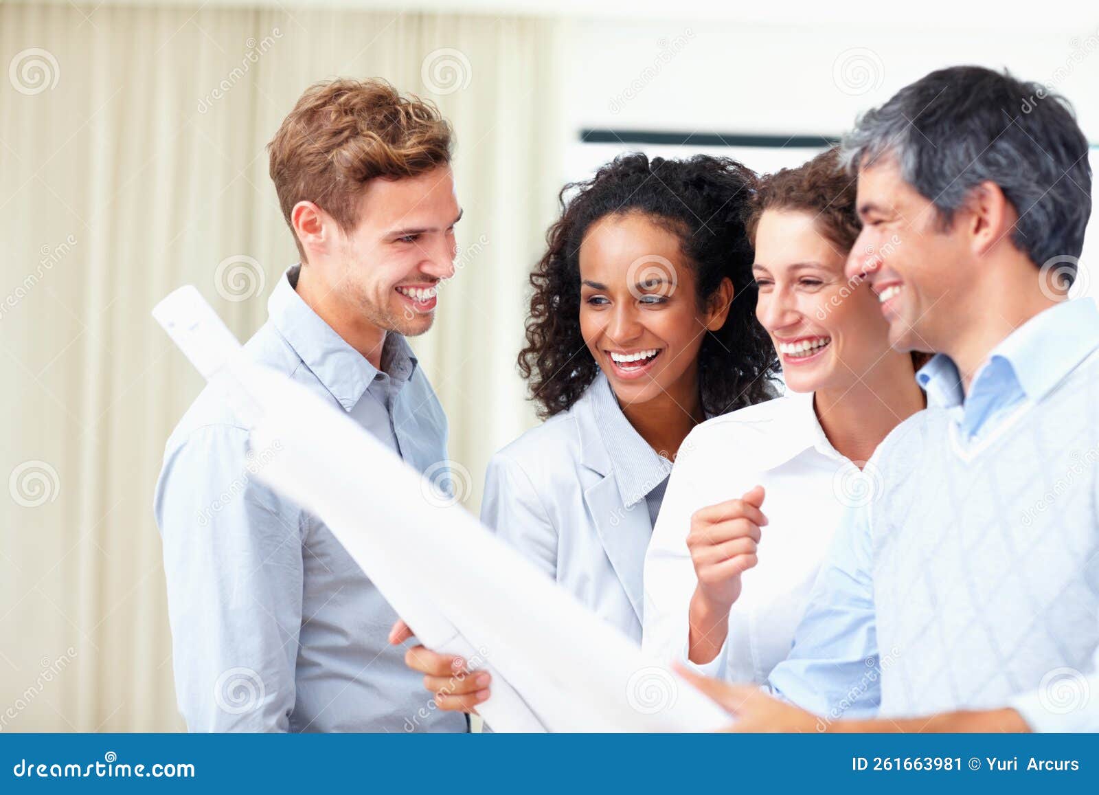 Discussing the Plan. Group of Business Architects in Discussion with ...