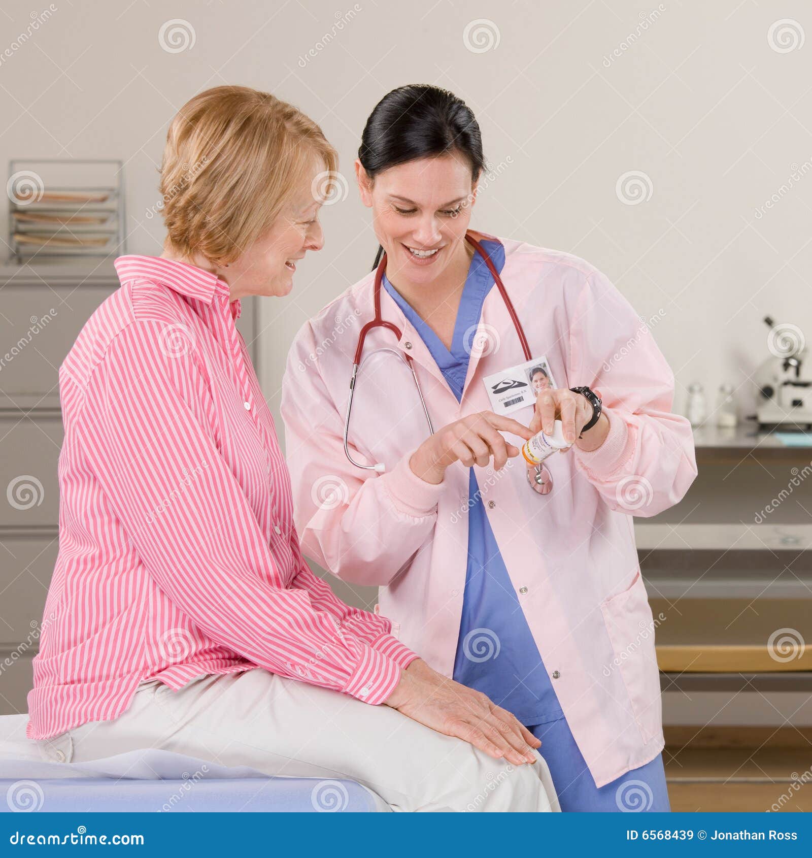 Discussing Prescription Medication with Woman Stock Image - Image of ...