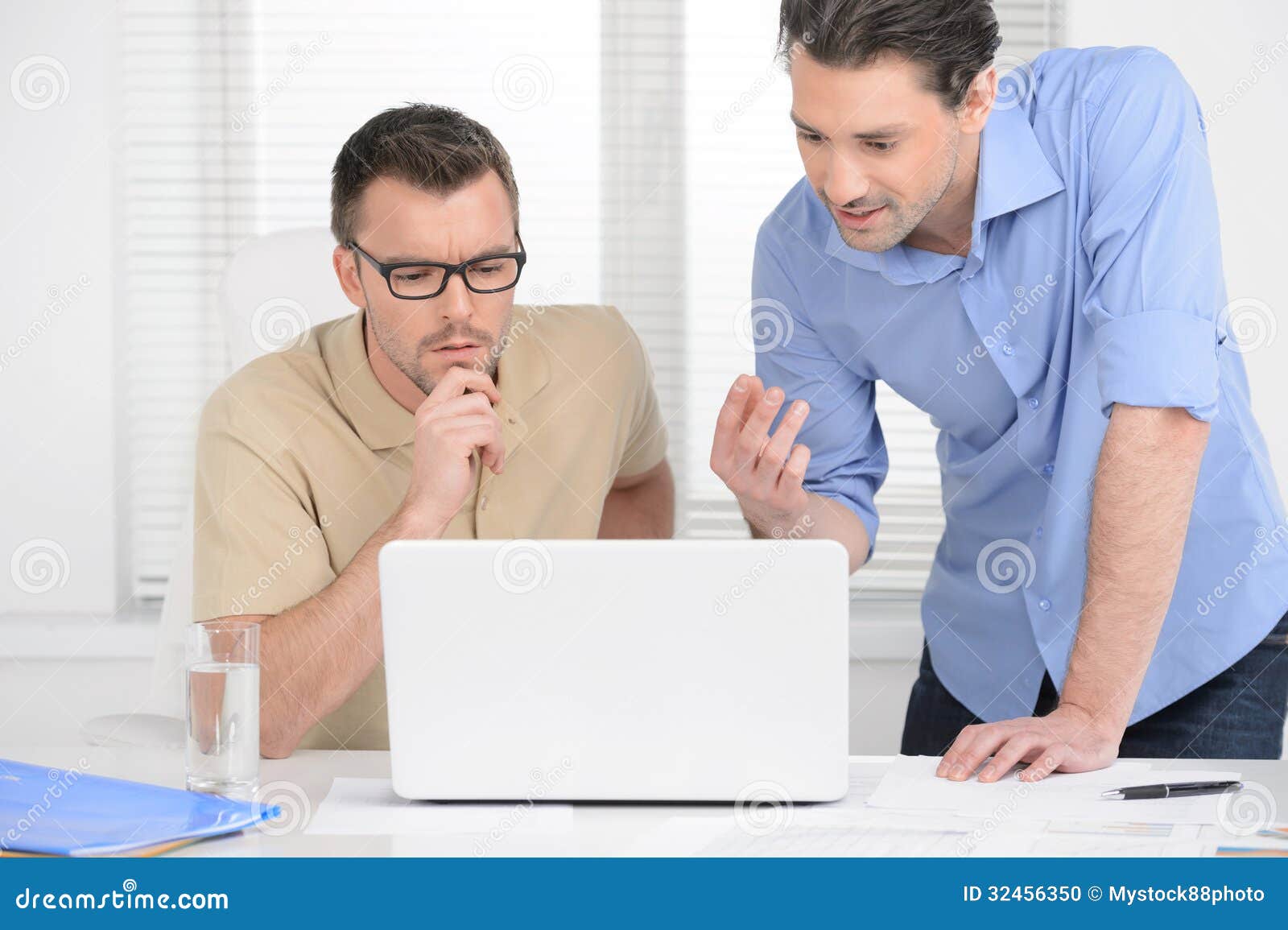 Discussing the Problem. Two Confident Business Man Discussing so Stock ...