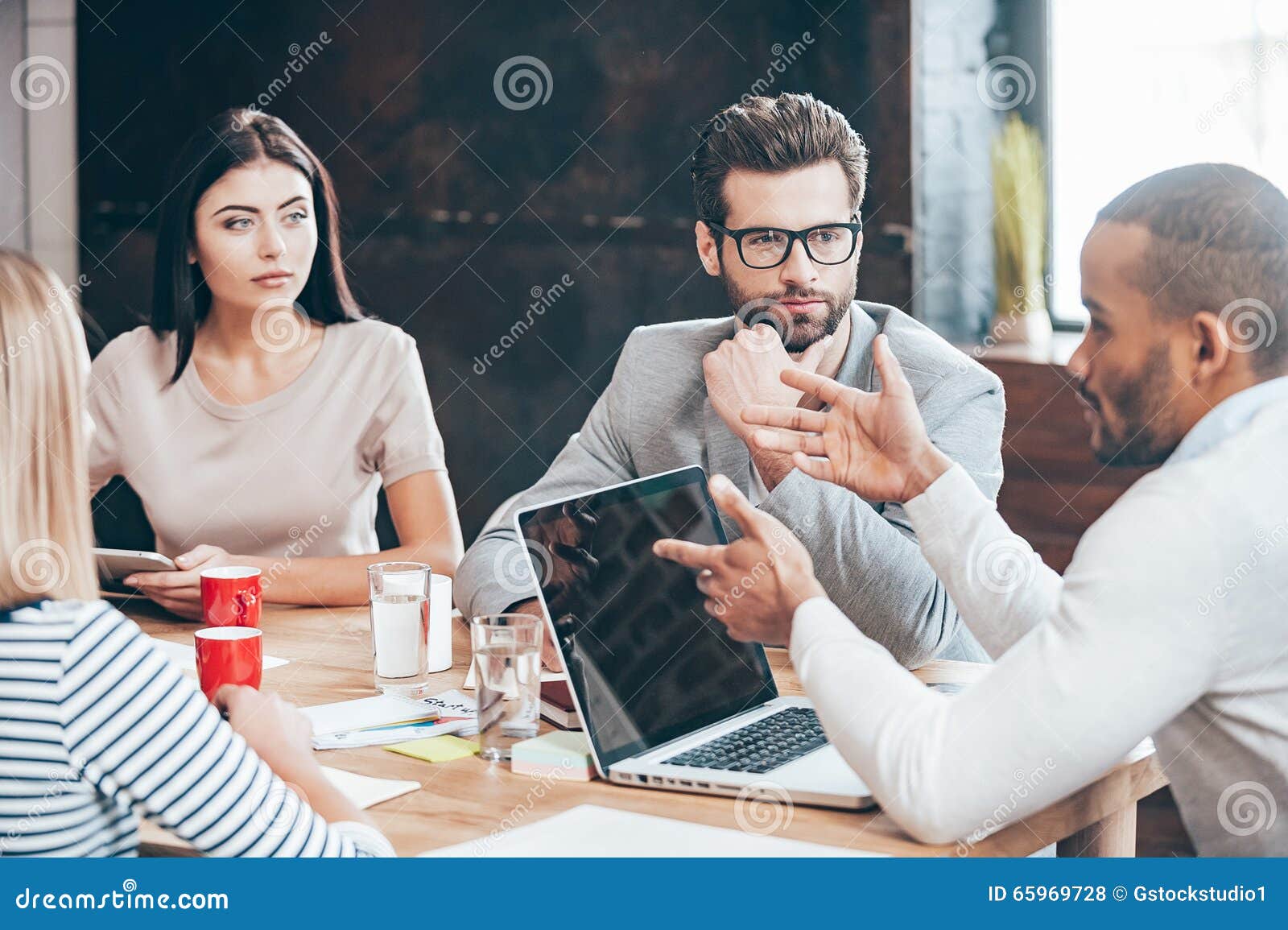 Discussing Some Business Issues. Stock Photo - Image of black, hand ...