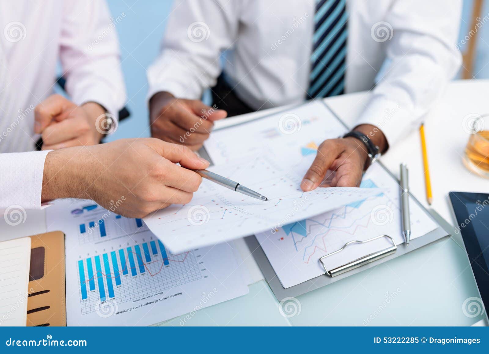 Discussing statistics stock image. Image of business - 53222285
