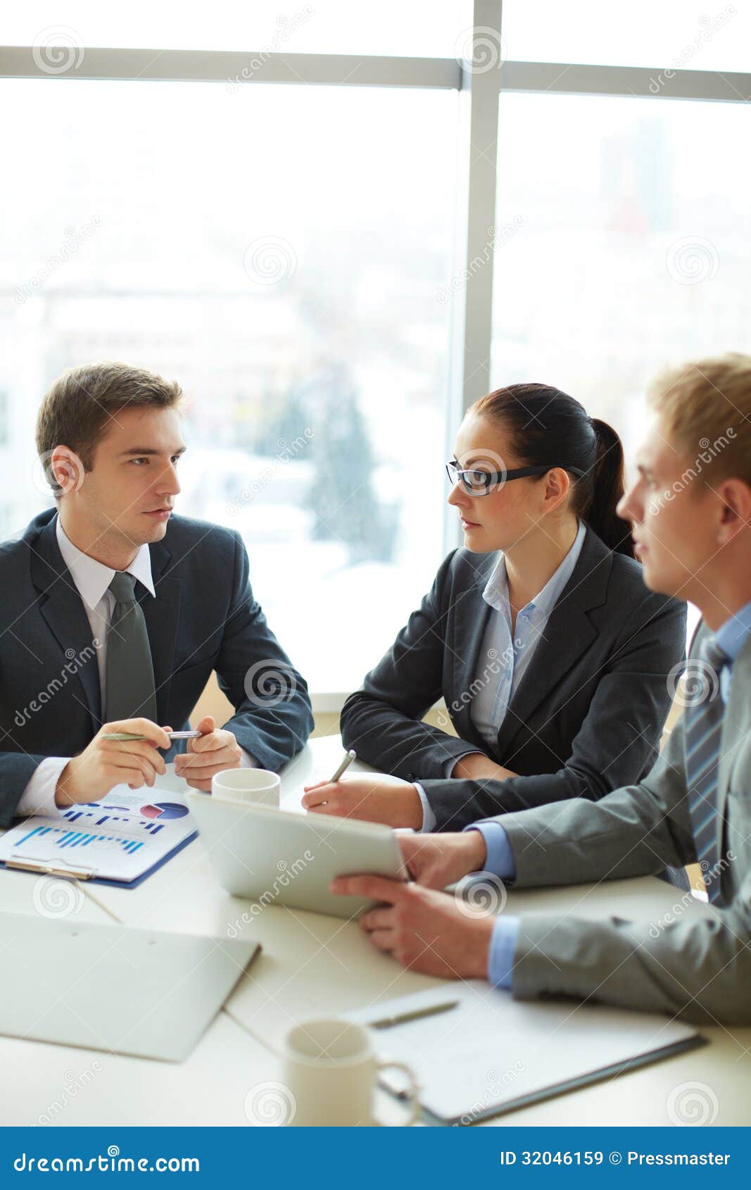 Discussing strategies stock image. Image of communicating - 32046159