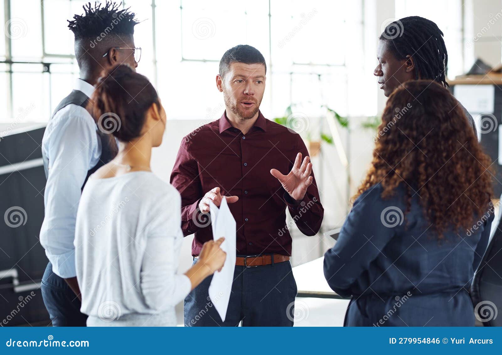 Discussing Their Next Big Plan of Action. a Group of Businesspeople ...