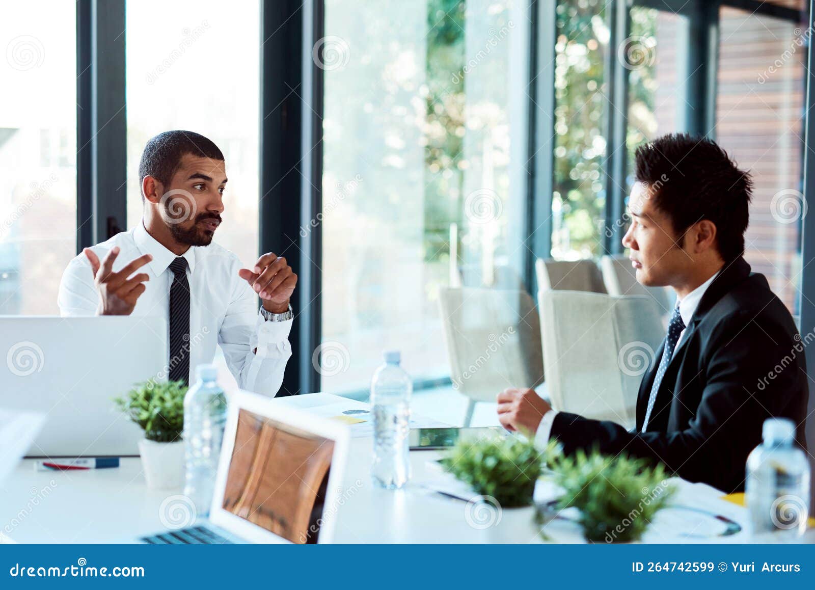 Discussing Ways To Improve Productivity. Businesspeople in the ... Discussing Ways To Improve Productivity. Businesspeople in the ...