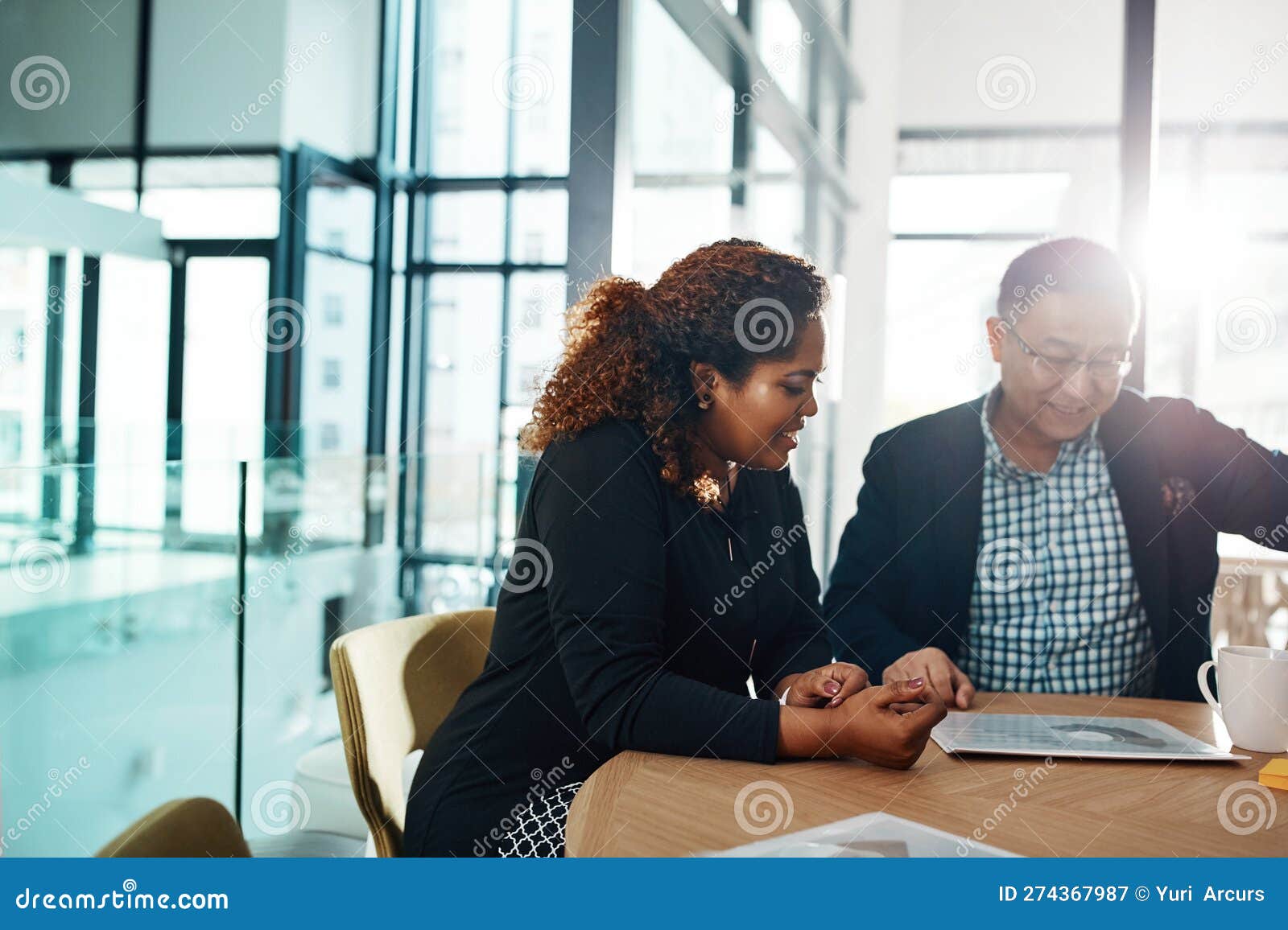 Discussing Ways To Profit from All Their Top Ideas. Two Businesspeople ... Discussing Ways To Profit from All Their Top Ideas. Two Businesspeople ...