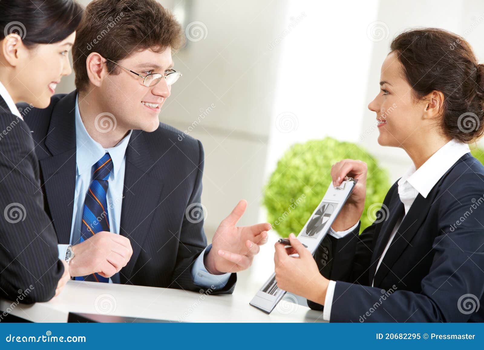 Discussing work stock image. Image of friendly, colleague - 20682295